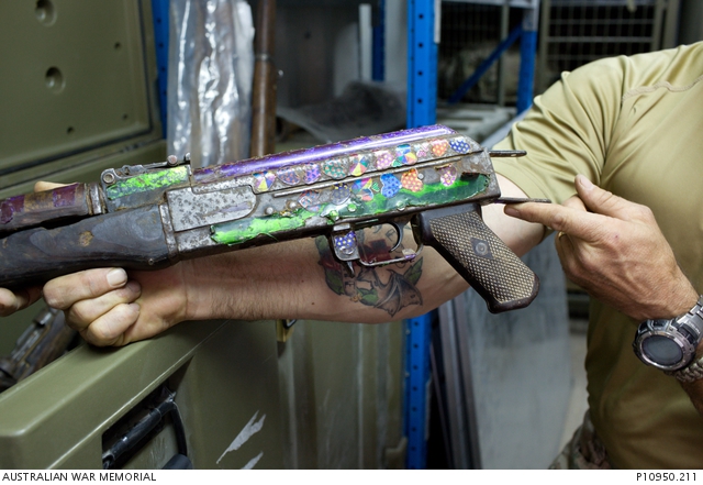 Warrant Officer Rodney Amos RAAF, an Explosive Ordnance Disposal (EOD ...