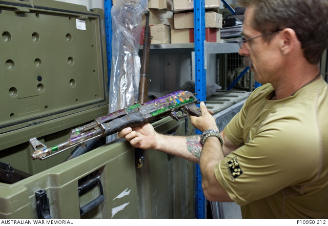 Warrant Officer Rodney Amos RAAF, an Explosive Ordnance Disposal (EOD ...