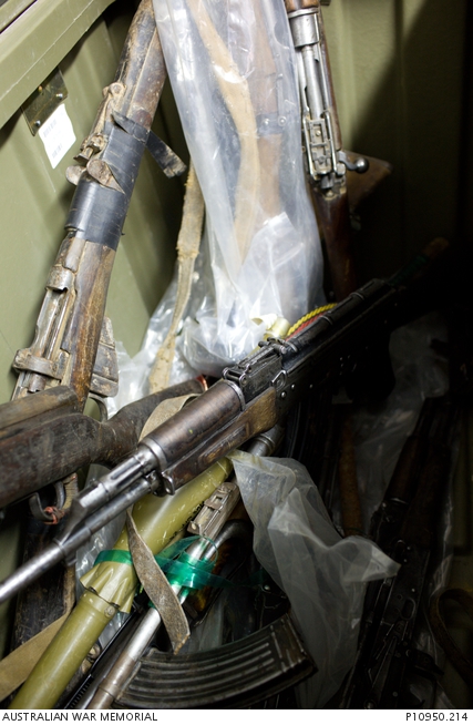 Weapons Intelligence Team (WIT) display of captured guns and other ...