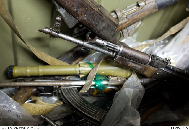 Weapons Intelligence Team (WIT) display of captured guns and other ...
