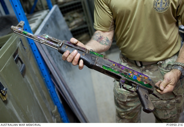 Warrant Officer Rodney Amos RAAF, an Explosive Ordnance Disposal (EOD ...