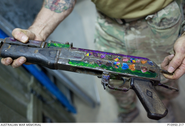 Warrant Officer Rodney Amos RAAF, an Explosive Ordnance Disposal (EOD ...
