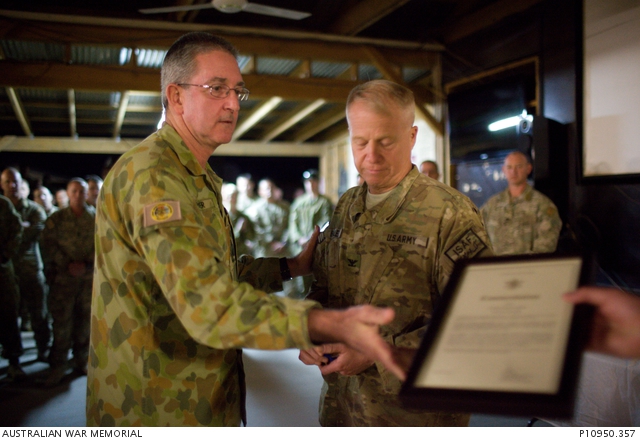 Lieutenant General Brian Ashley (Ash) Power handing out medals of ...