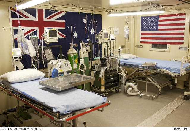 Role 2 Hospital ward, Tarin Kot. Australian and US flags hang from the ...