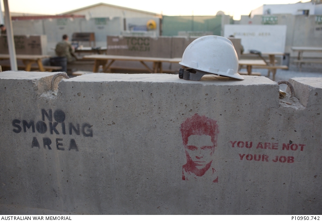 Zerosix graffiti art on blast walls at the UK NAFFI inside Kandahar Air ...