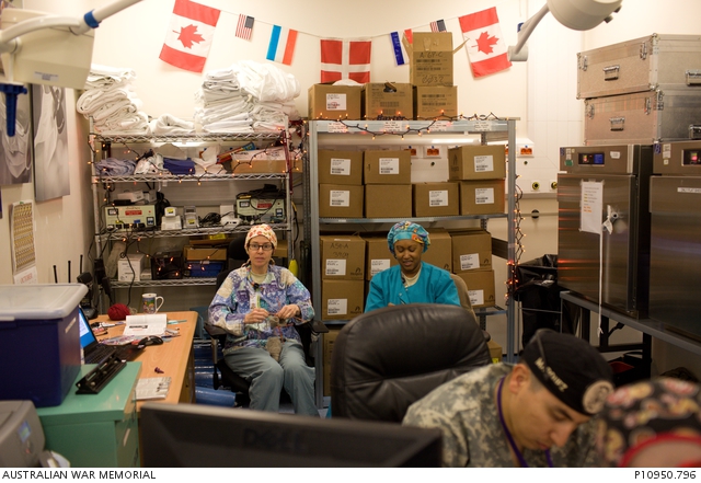 US medical staff knitting at the US run Role III Multinational Medical ...