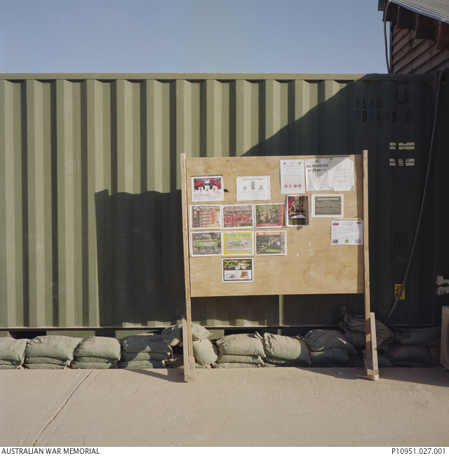 Noticeboard at Kamp Holland. | Australian War Memorial