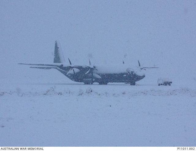 A C-130 Hercules during a snow storm at Kabul airfield. | Australian ...