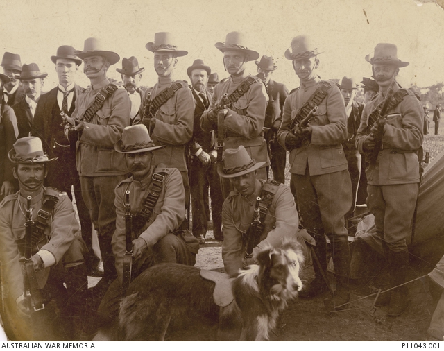 "Bushie", a collie dog, with members of the 3rd Victorian Bushmen ...