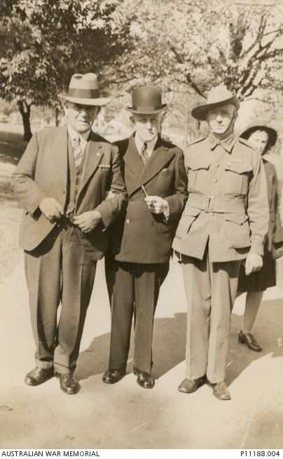 Informal portrait of V365553 Donald Wallace Eunson, D H Ross, and F H ...