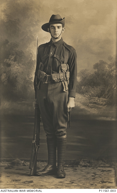 Studio portrait of an Australian serviceman wearing a cadets uniform ...