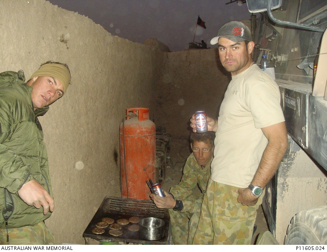 Three Mentoring and Reconstruction Task Force 1 (MRTF-1) personnel ...