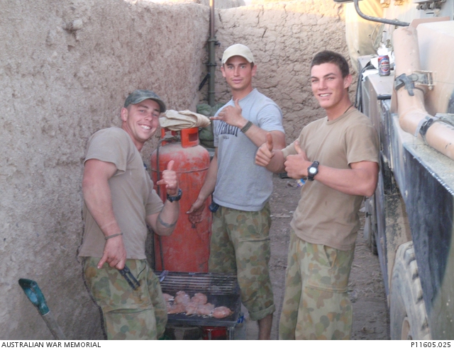 Three Mentoring and Reconstruction Task Force 1 (MRTF-1) personnel ...