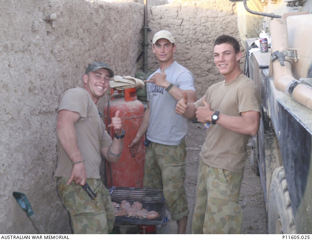 Three Mentoring and Reconstruction Task Force 1 (MRTF-1) personnel ...