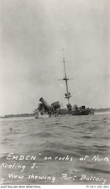 "The Emden ashore on North Keeling."(Album caption)."Emden on rocks at ...