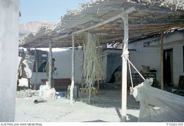 Grenade damage to a building resulting from an attack by pro-Indonesian ...
