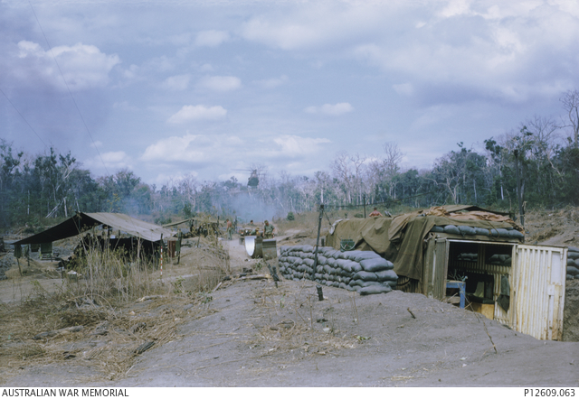 At an unidentified Fire Support Base during firing of a 105mm M2A2 ...