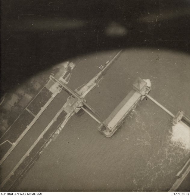 Photograph of locks on the Rhine as captured through the bomb-aim of an ...