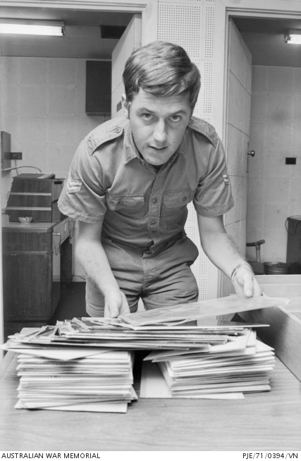South Vietnam. July 1971. Corporal Andy Phillips of Adelaide, SA, sorts ...