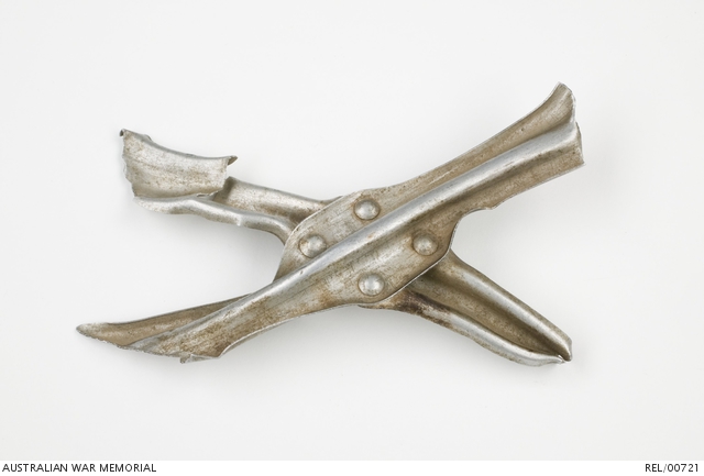 Fragment of metal from Zeppelin L31 : A H Gold | Australian War Memorial