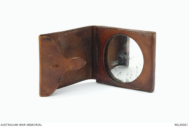 Glass shaving mirror in leather case | Australian War Memorial