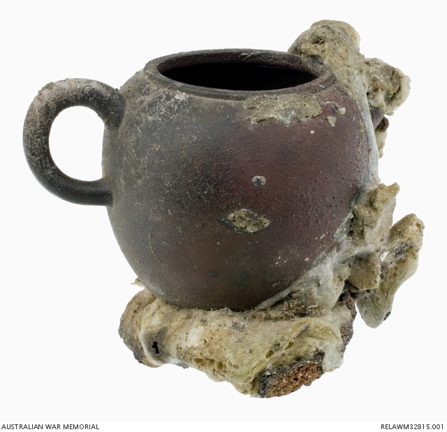 Damaged cup, atomic blast Hiroshima | Australian War Memorial