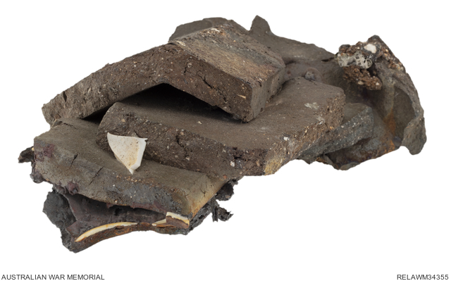 Damaged terracotta tile, atomic blast Hiroshima | Australian War Memorial