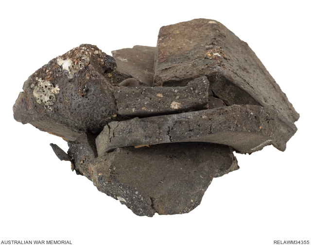 Damaged terracotta tile, atomic blast Hiroshima | Australian War Memorial