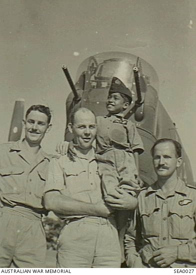 Digri, Bengal, India. 1944-11-27. Three RAAF members of No. 159 ...