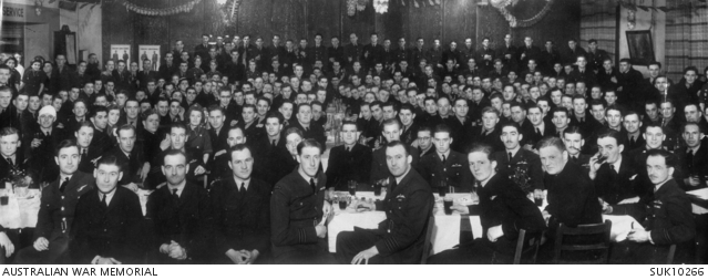 England. 1941-12-24. No. 455 Squadron RAAF at Christmas Eve dinner ...