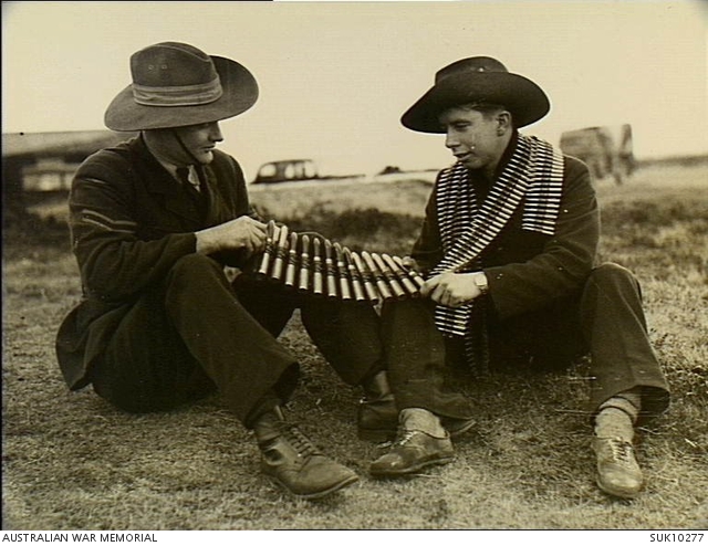 Wales. C. 1942-01. Group portrait of Corporal Jack Stokes, left, of Qld ...