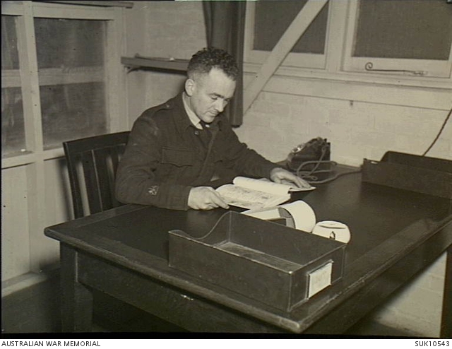 Plymouth, England. C. 1943-02. Portrait of 2332 Warrant Officer J. E ...
