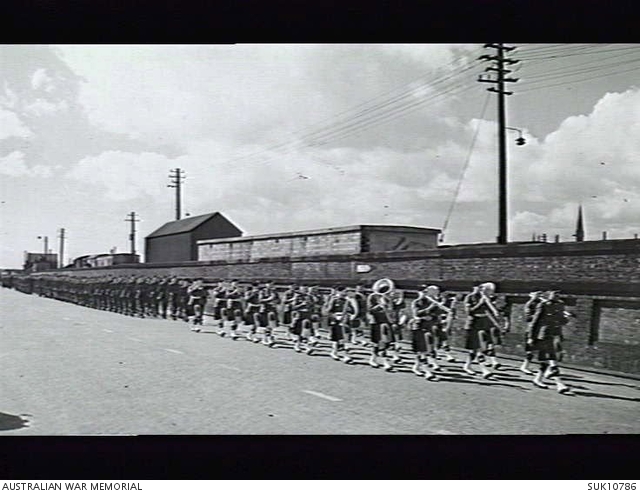 Dundee, Scotland. 1943-04-25. Led by an army brass band, members of No ...