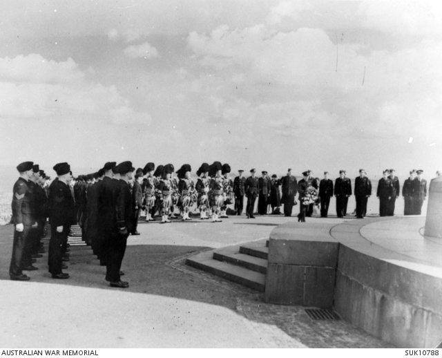 Dundee, Scotland. 1943-04-25. Led by the local police pipe band ...