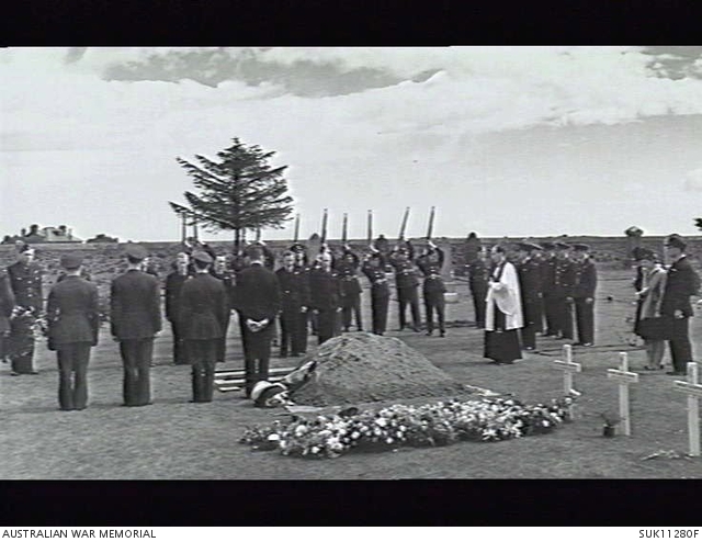 Scotland. 1943-08-11. The firing party firing a volley at the funeral ...