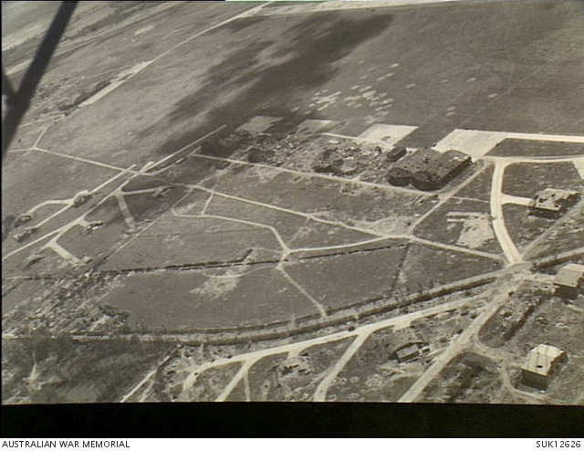 Carpiquet, France. C. 1944-08. Wrecked hangars on Carpiquet airfield ...