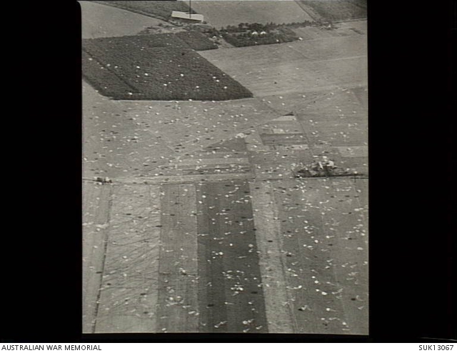 Holland. 1944-09-17. The landscape covered with parachutes while others ...