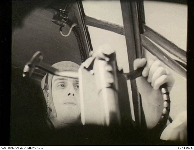 The captain, Flight Lieutenant Jack Rand, at the controls of a ...