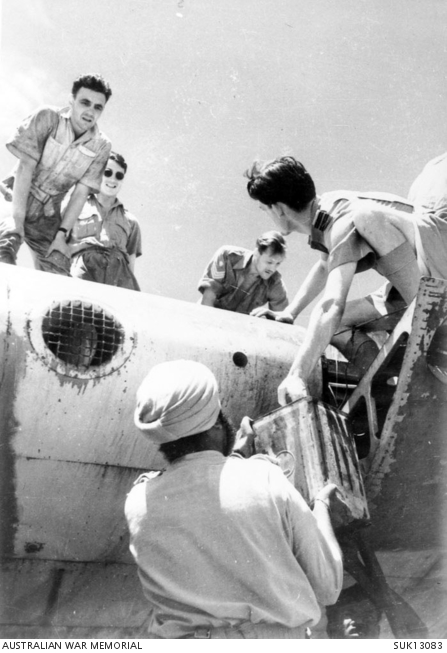 1944-10. Maintenance being carried out on a Sunderland aircraft of an ...