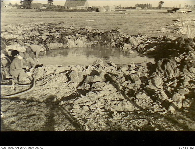 A crater caused by the first German jet propelled aircraft crash which ...