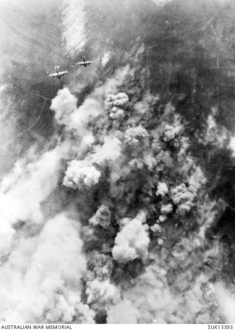 Duren, Germany. 1944-11. Dense smoke rising from the hail of bursting ...