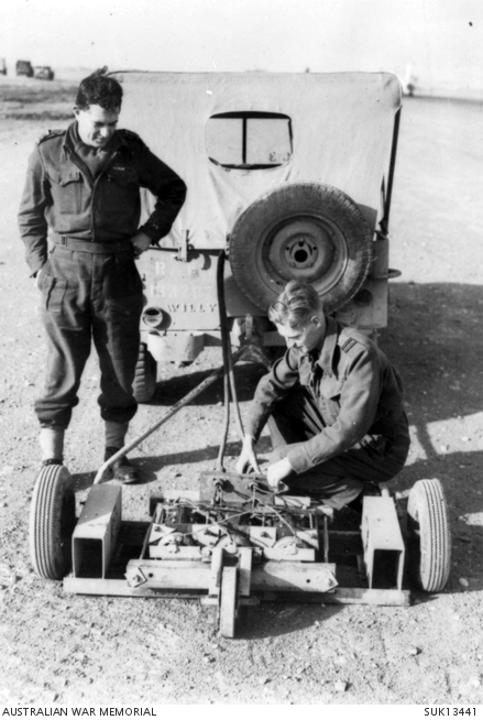 Italy. C. 1944-11. The "snifter" - a magnetic sweep - being set for use ...