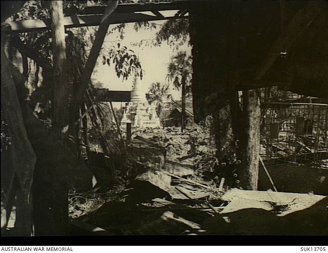 Ye-U, Burma. C. 1945-02. A Burmese pagoda seen through bomb ruins in Ye ...