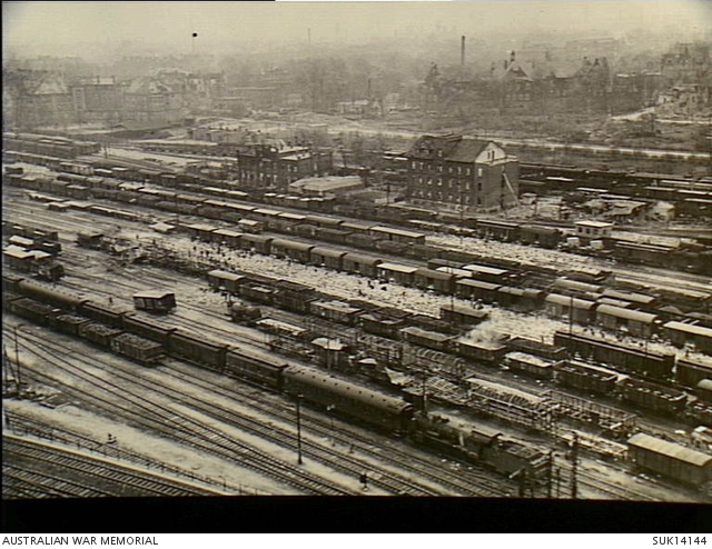 Hanover, Germany. C. 1945-04. German civilians busily looting the ...