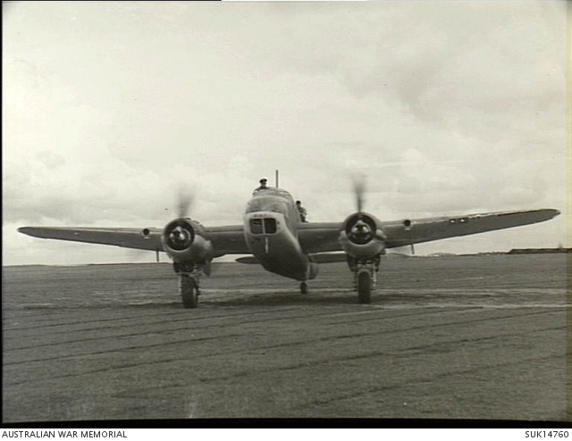 Singapore. C. 1945-11. An RAAF Beaufort bomber aircraft taxies in on ...