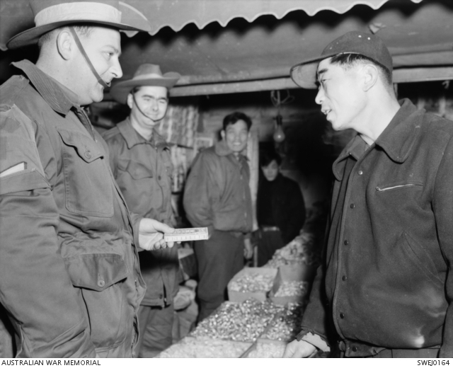Shopping for souvenirs to take home from Korea are Queensland soldiers ...