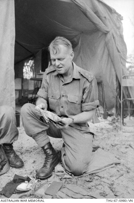 Vietnam. 1967-10. Task Force Commander Brigadier Stuart Graham examines ...