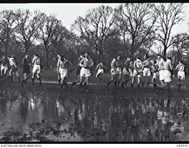 LONDON, ENGLAND. 1944-01-23. PLAYERS IN AN AUSTRALIAN RULES FOOTBALL ...