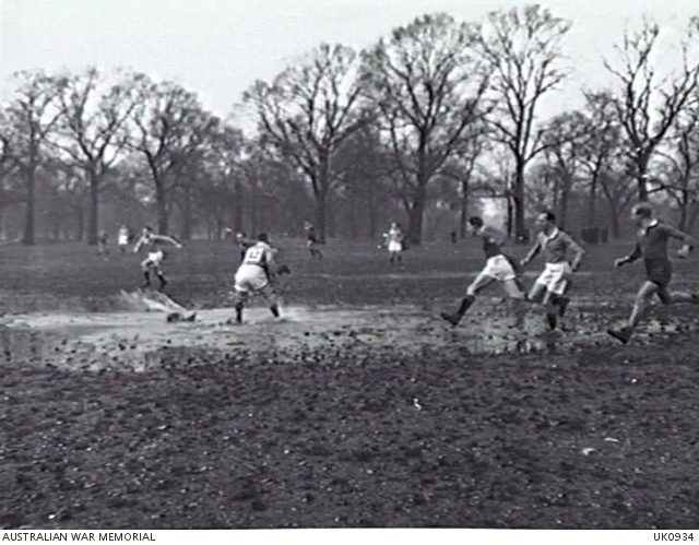 LONDON, ENGLAND. 1944-01-23. PLAYERS IN AN AUSTRALIAN RULES FOOTBALL ...