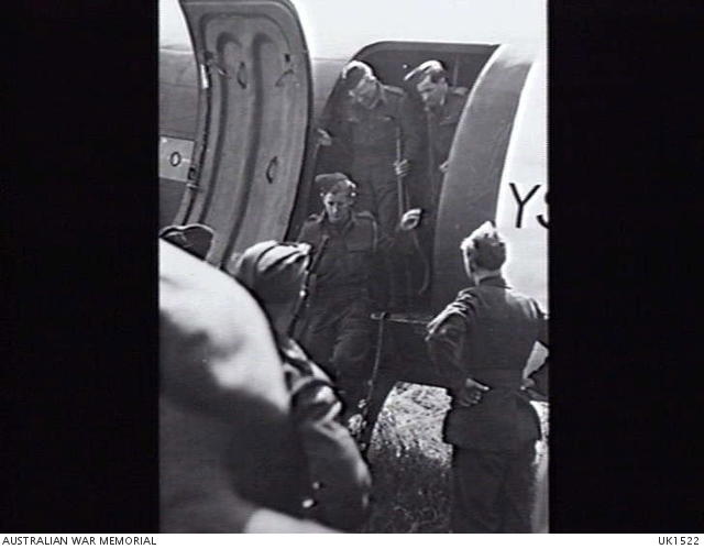 NORMANDY, FRANCE. C. 1944-06. RAF GROUND CREW ARRIVING AT A BEACH-HEAD ...